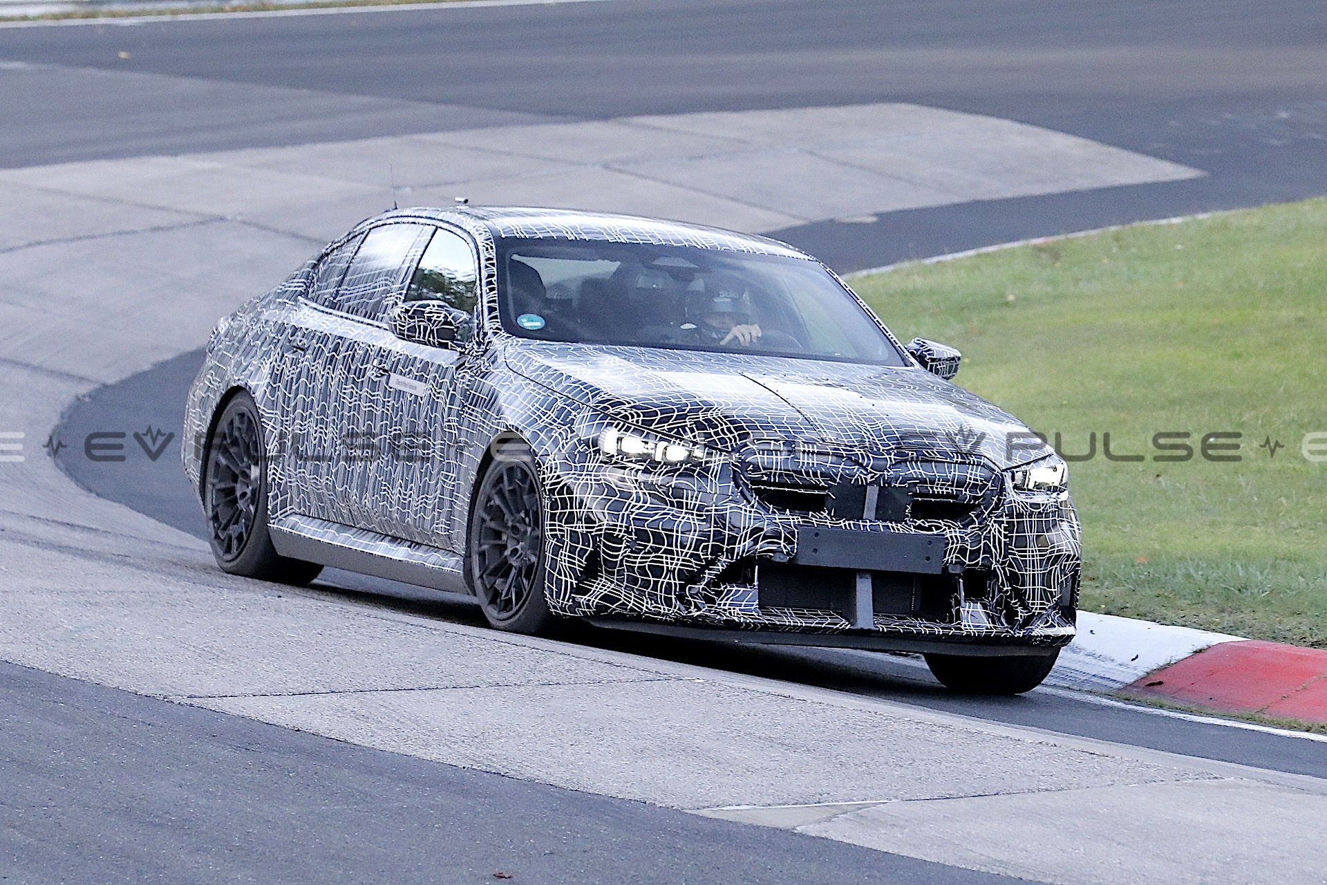 Updated BMW hybrid-powered M5 shows of its glowing rotors at the ‘Ring ...